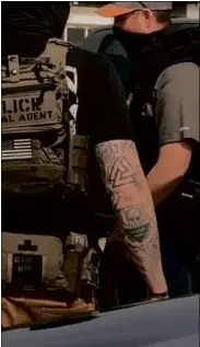 Agent’s tattoo sparks questions - PressReader