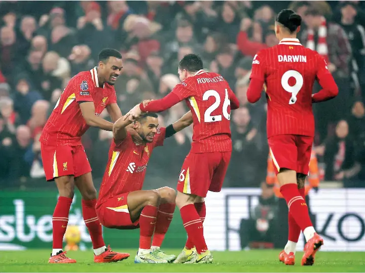 Liverpool power 7 points clear - PressReader