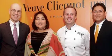 Feasting on good bubbly; grand ball to raise funds for Intramuror­s ...