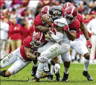 No Tua is no problem against FCS Catamounts - PressReader