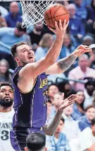 Doncic lights up Mavs in Dallas return - PressReader