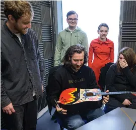Band surprises kids with visit - PressReader