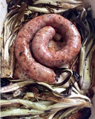 Rachel Roddy’s recipe for sausages with braised chicory - PressReader