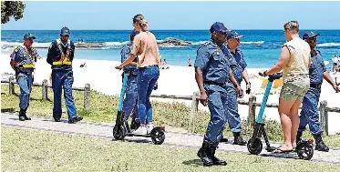 Bobbies on the beach in summer - PressReader