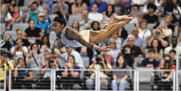 Biles proud of progress after dominant win - PressReader