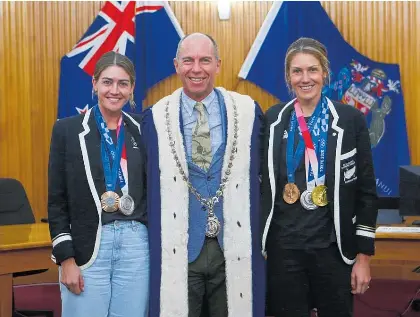 Olympian sisters given special welcome - PressReader