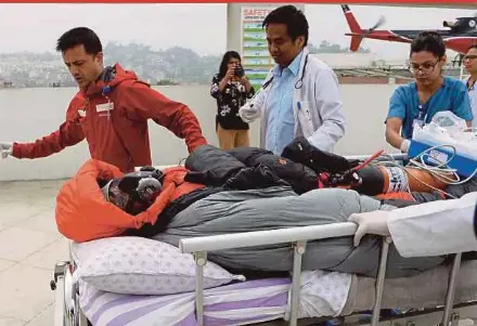 ‘MIRACLE’ RESCUE FOR MALAYSIAN CLIMBER - PressReader