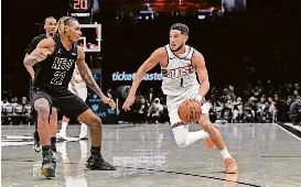 Booker’s Nike Book 2 shoes ‘pay homage’ to Phoenix - PressReader