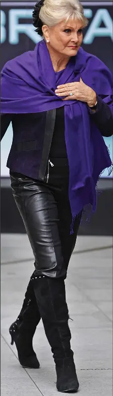 In leather trousers and knee-high boots, Angela Rippon at 71 - PressReader