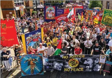Banners aloft in celebratio­n of working-class movement - PressReader