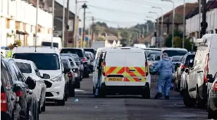 Police hunt Joker mask suspect after two men shot dead in ‘gang war ...