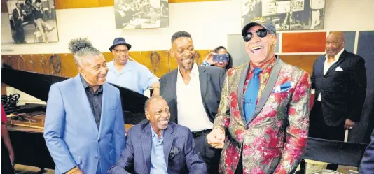 Famed R&B group The Spinners donate performanc­e outfits to Motown ...