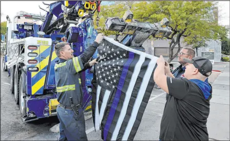 Procession honors fallen troopers - PressReader