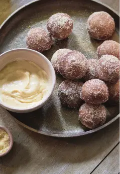 MINI DOUGHNUTS WITH ORANGE CURD & CARDAMOM SUGAR - PressReader