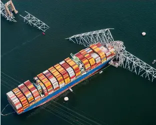 Baltimore bridge collapse: crew members from ship still held by US two ...