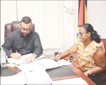 Ministry signs contracts for living quarters at Mazaruni prison ...