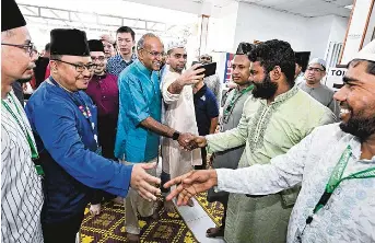 Under Constituti­on, NMPs can step down, run in elections: Shanmugam ...