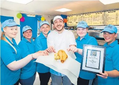 Marcello Franceschi serves up some of his award-winning fish and chips ...