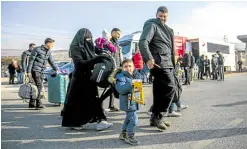 SYRIAN REFUGEES RETURN AS CARETAKER PM APPOINTED - PressReader