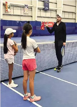 Ukrainian tennis coaches training N.S. talent - PressReader