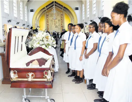 Students of Immaculate Conception High School view the body of Sister ...