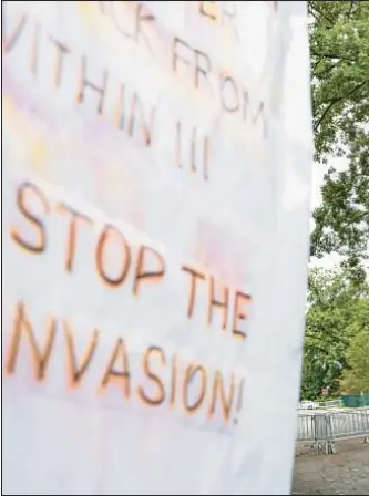 Judge orders migrants out of shut school, but city to appeal - PressReader