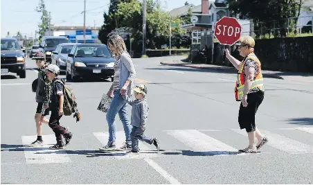 Saanich looks at cutting crossing guards - PressReader