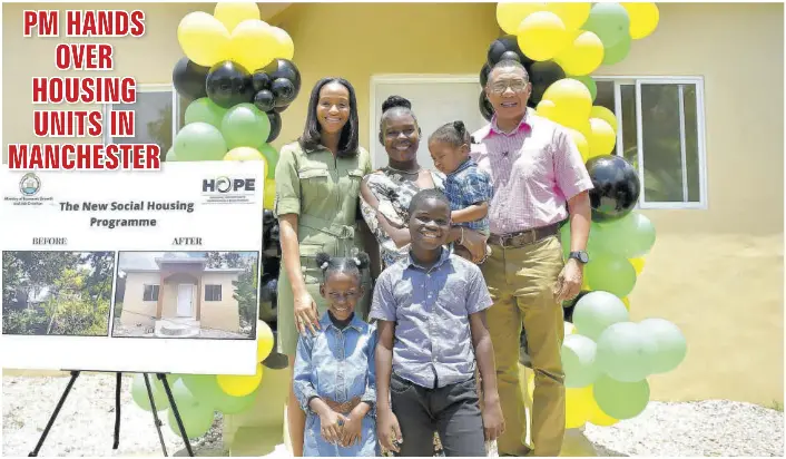 PM HANDS OVER HOUSING UNITS IN MANCHESTER - PressReader