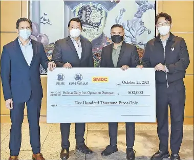SM employees donate Christmas party fund to charities - PressReader