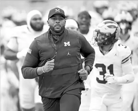 Moore still in custody amid probe - PressReader