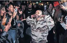 Toronto woman steals show at Drake lookalike contest - PressReader