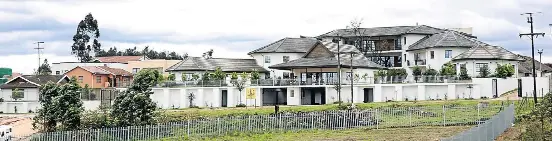 12 GARAGES, 28 BEDROOMS, LOTS OF DOSH - PressReader