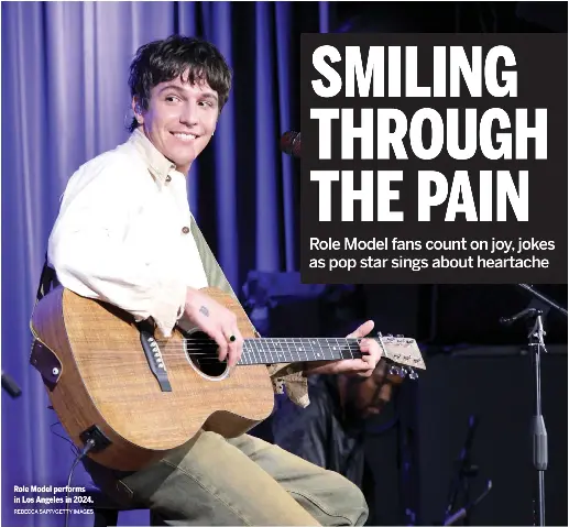 SMILING THROUGH THE PAIN - PressReader