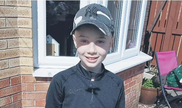 Friends shave their heads to support superhero Archie in cancer relapse ...