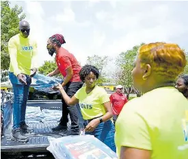 Utility companies unite to assist St Elizabeth residents - PressReader