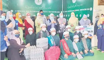 Council, RTM visit 14 tahfiz centres in Tawau - PressReader