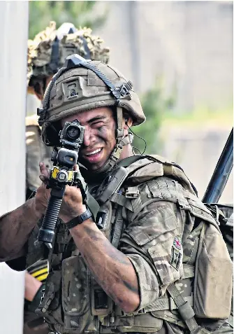 Taking aim - PressReader