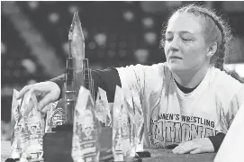 Iowa secures 3 individual national titles - PressReader