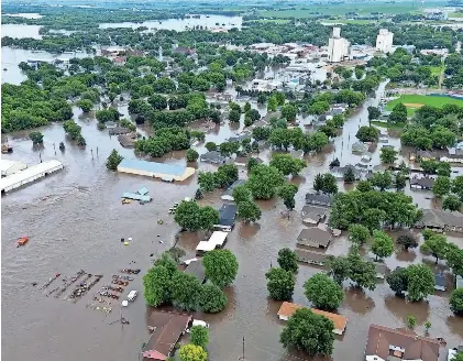 Heat wave in central US; flooding persists in Iowa - PressReader