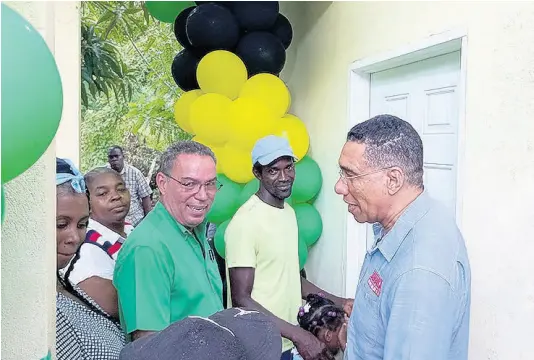 Portland families get new homes under social housing programme ...