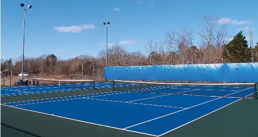 Tennis court project one of several recent improvment­s around Linden ...