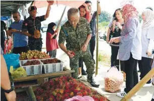 King awed by warm welcome in Sabah - PressReader