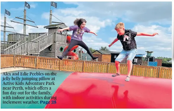 Alex and Edie Peebles on the jelly belly jumping pillow at Active Kids ...