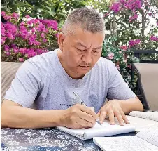 Millionair­e sits for ‘gaokao' exams for 27th time - PressReader