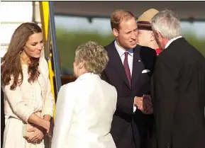 Cheering thousands turn out to greet William and Kate - PressReader
