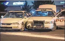 Fleeing suspect crashes into two APD police cars - PressReader