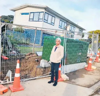 Homeowner caught between a fence and a hard place - PressReader