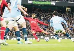 Salah-inspired Liverpool beat Man.city to open up 11-point Premier League lead, Newcastle win ...