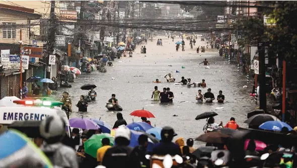 Philippine­s declares state of calamity as floods paralyse capital - PressReader