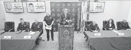 Albert Iavarone’s wife, inside with two of their children, finds her ...